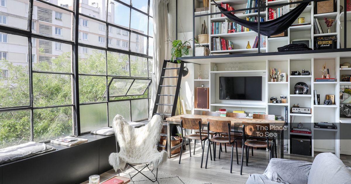 Small design loft with large bay industrial window black and white ...