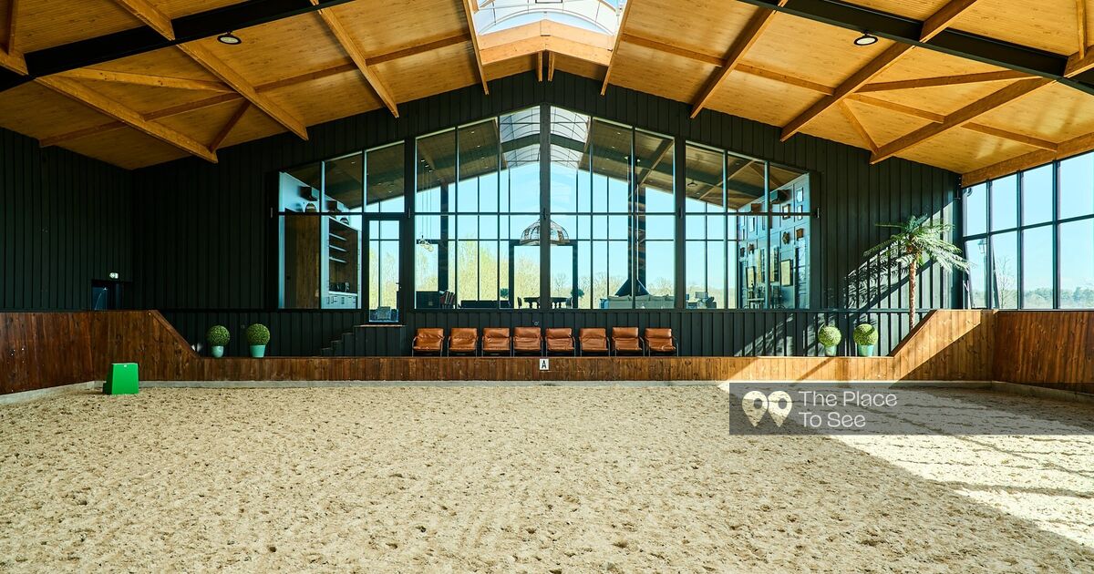 Beautiful stables with large bay windows and indoor and outdoor riding ...